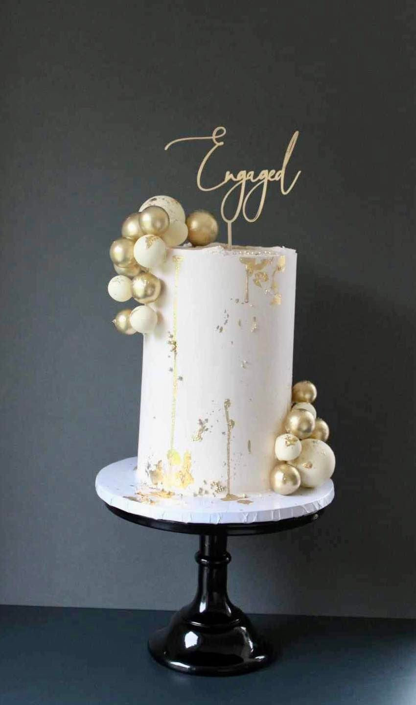 Gold bauble & gold splash detail celebration cake – Lovely Little Cakes UK